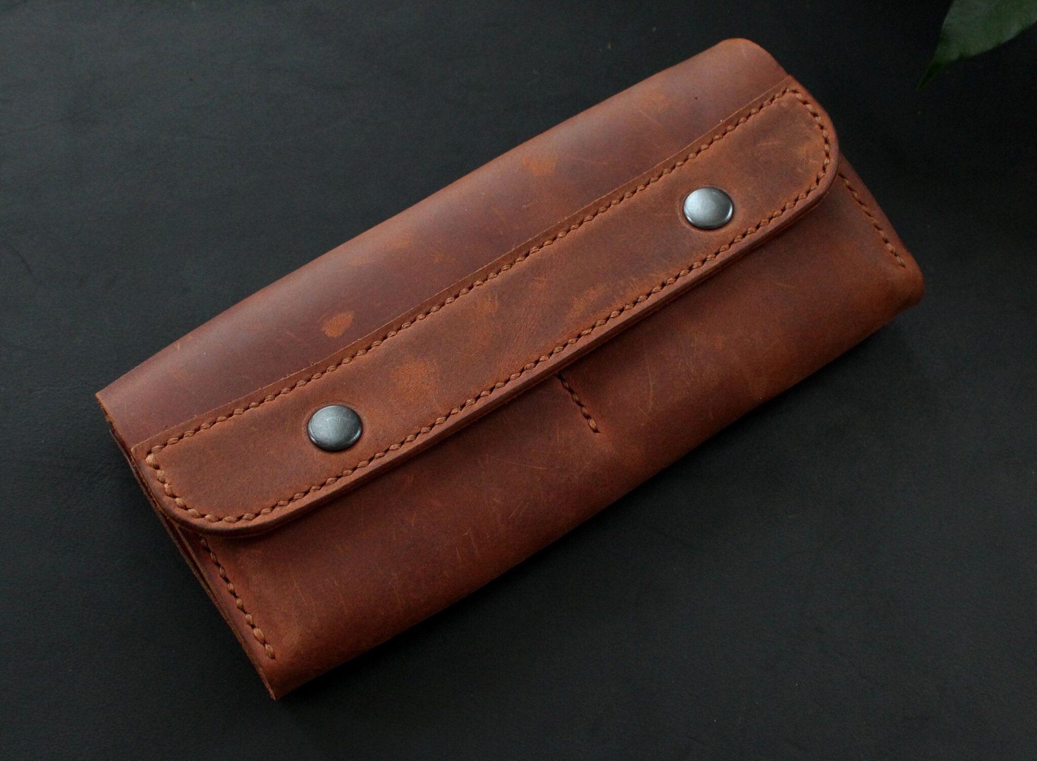 Large custom hand tooled leather wallets | Anger Refuge
